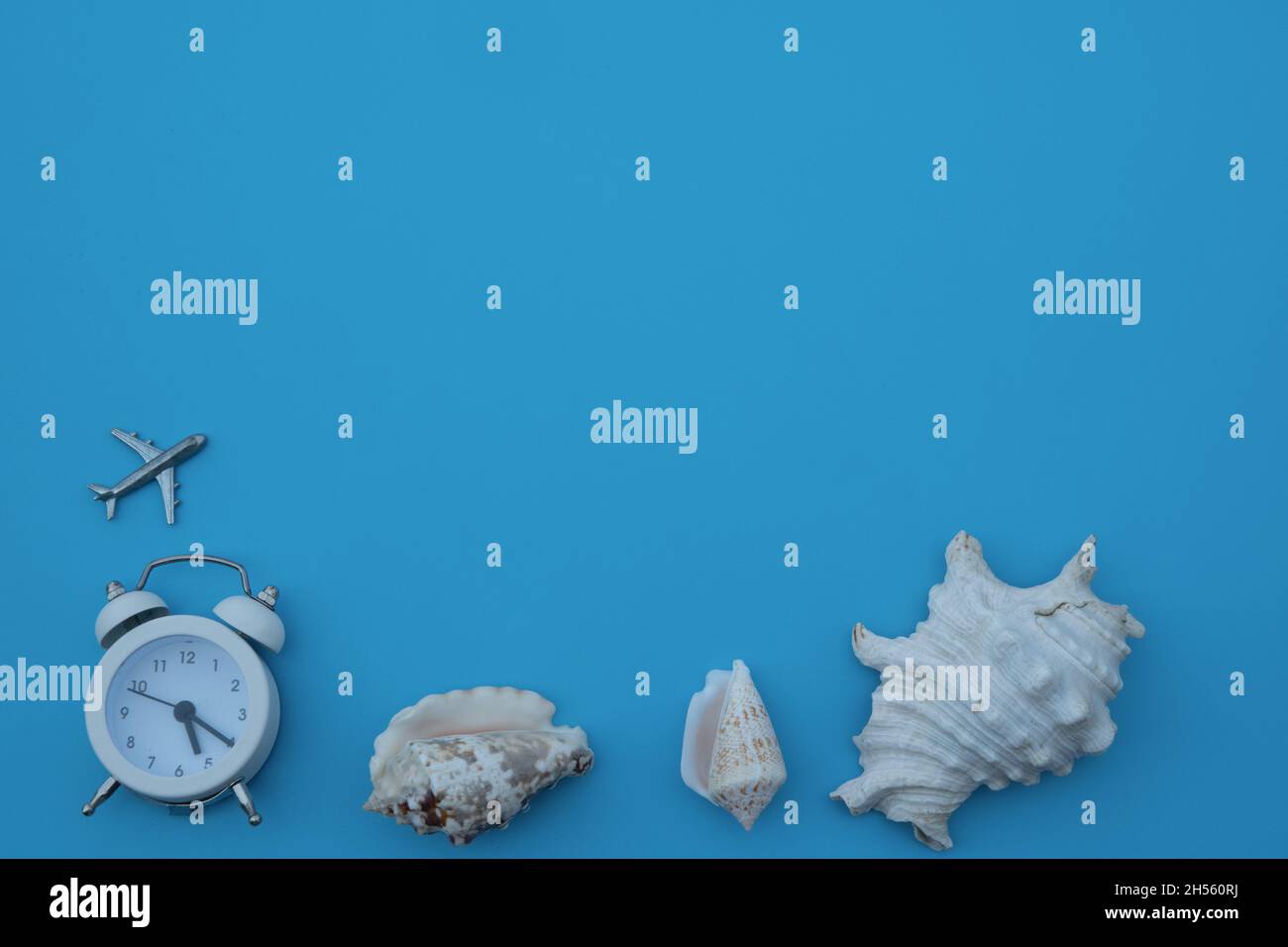 Wood Blocks on Light Blue Table with Sea Shells, Starfish, Beach Hat ...