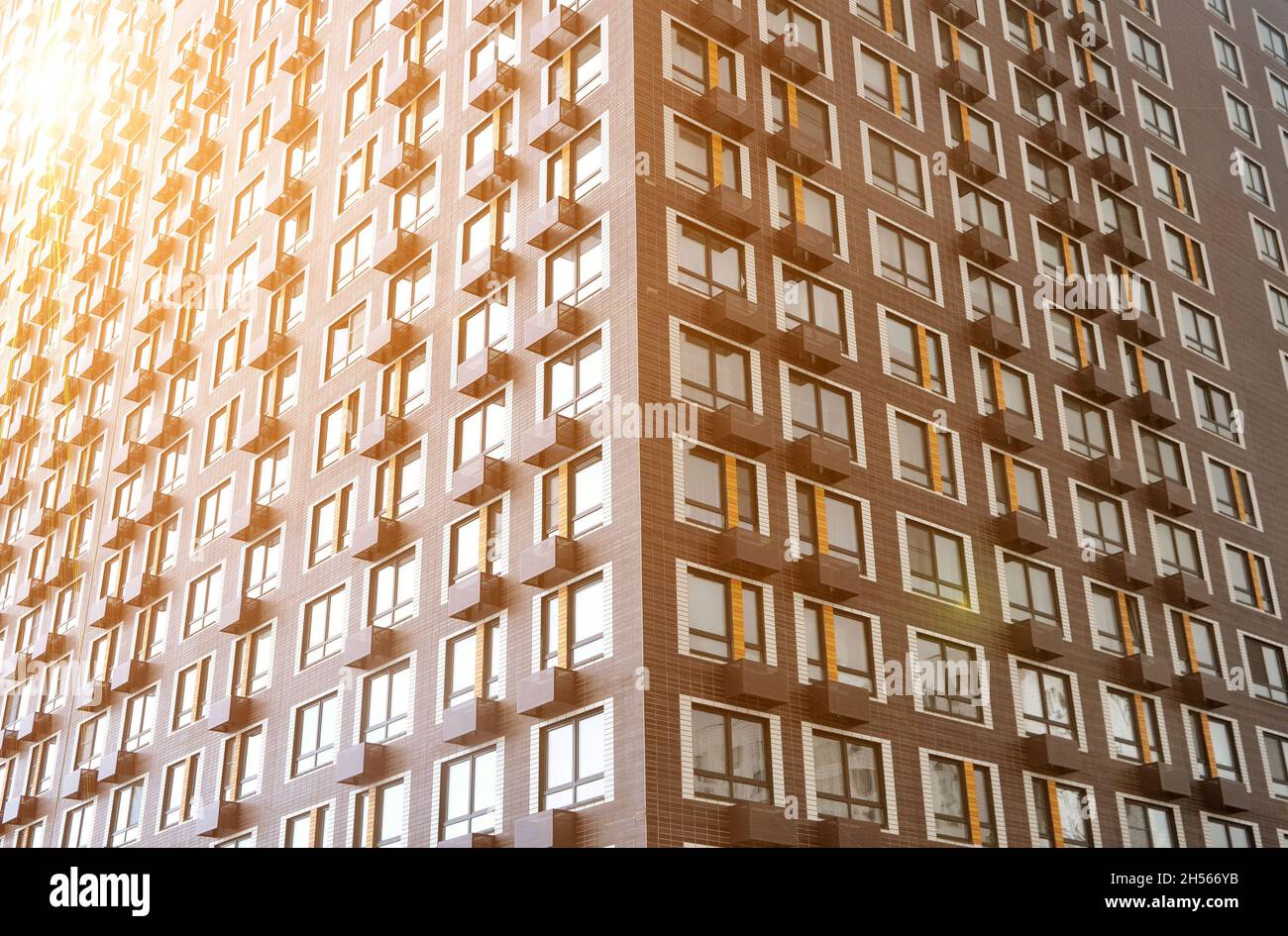 The corner of the front side of a new multi-storey residential building ...