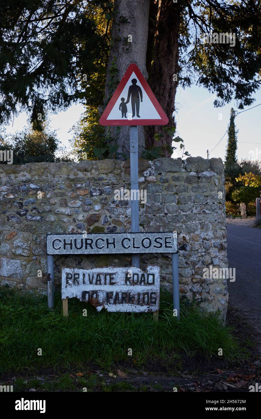 Fontal view of an adult and child warning traffic sign Stock Photo - Alamy