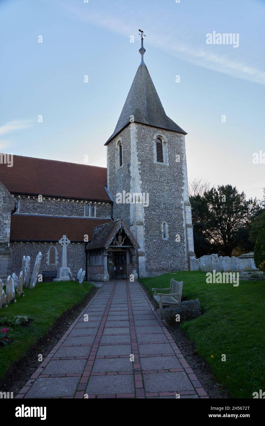 Paved path leading to the old church of Pagham Stock Photo - Alamy