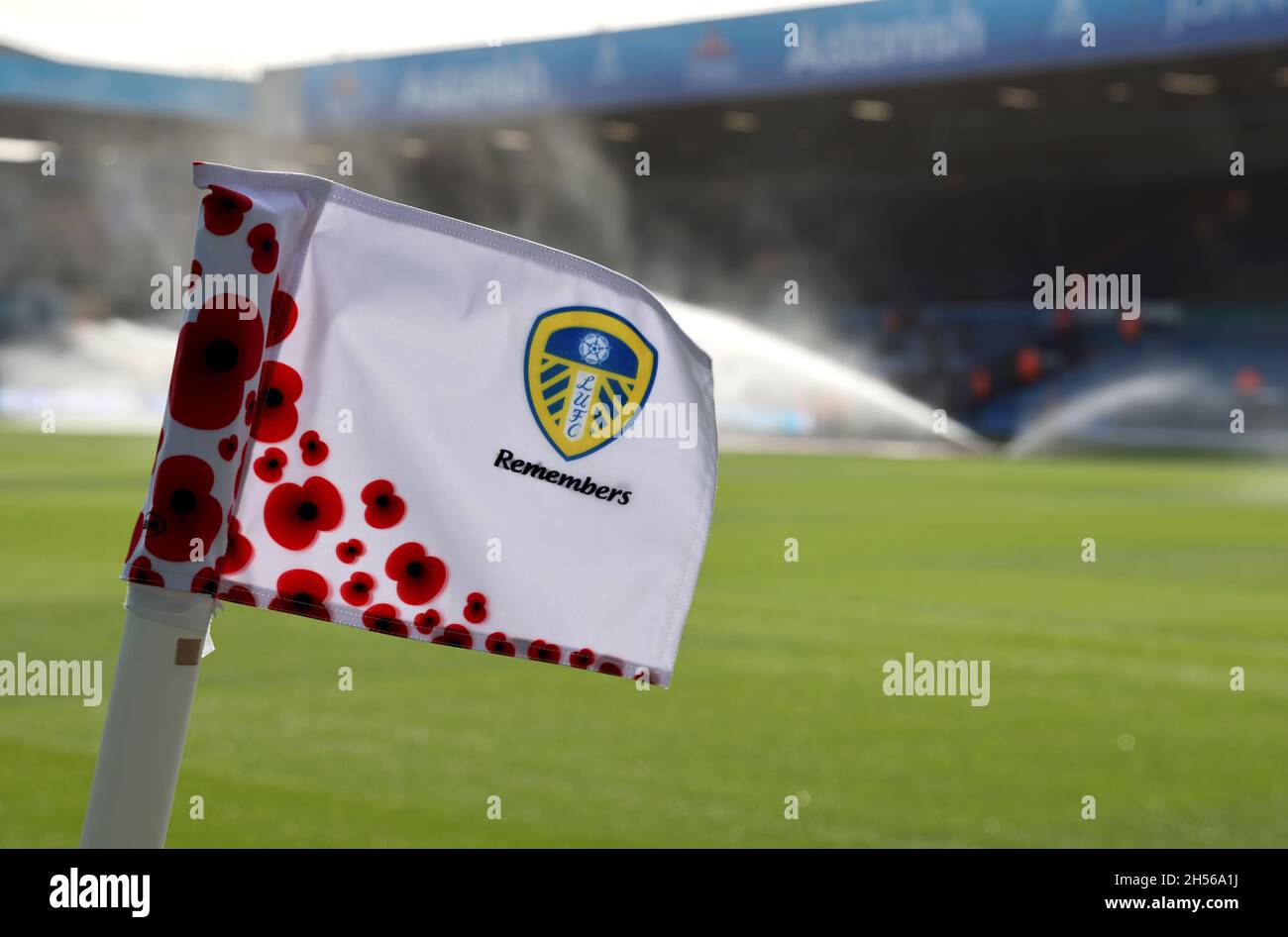 A Leeds United branded corner flag with poppies and the word Remembers ...