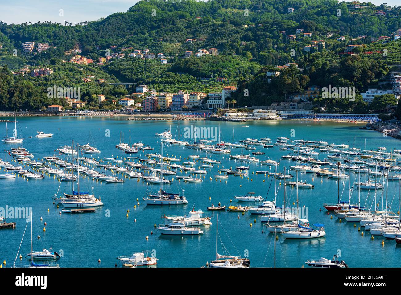 Port with many recreational boats moored and beaches of the small ...