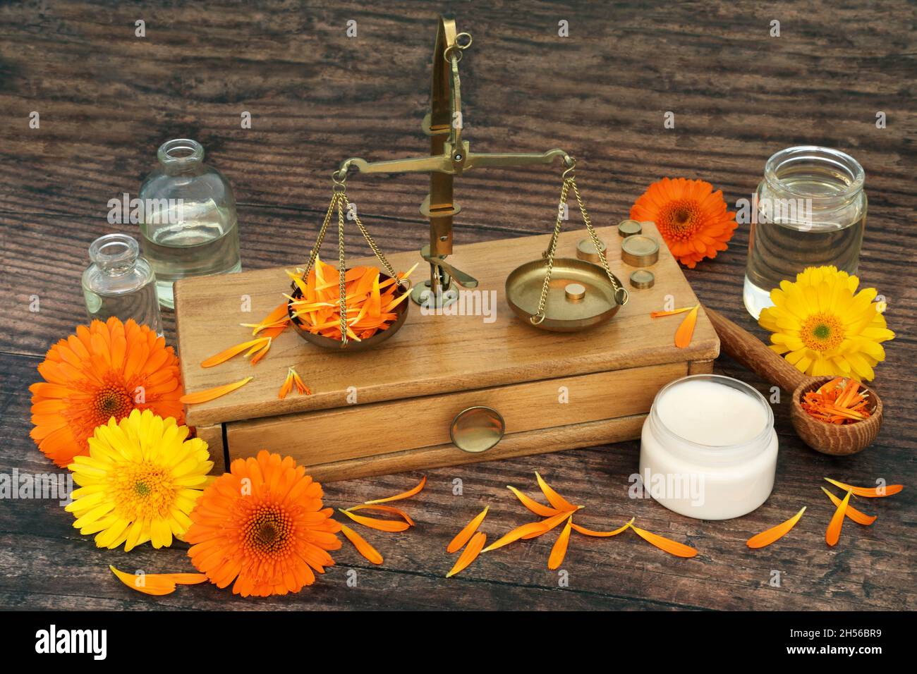 Calendula flower preparation for natural skincare remedies with brass ...