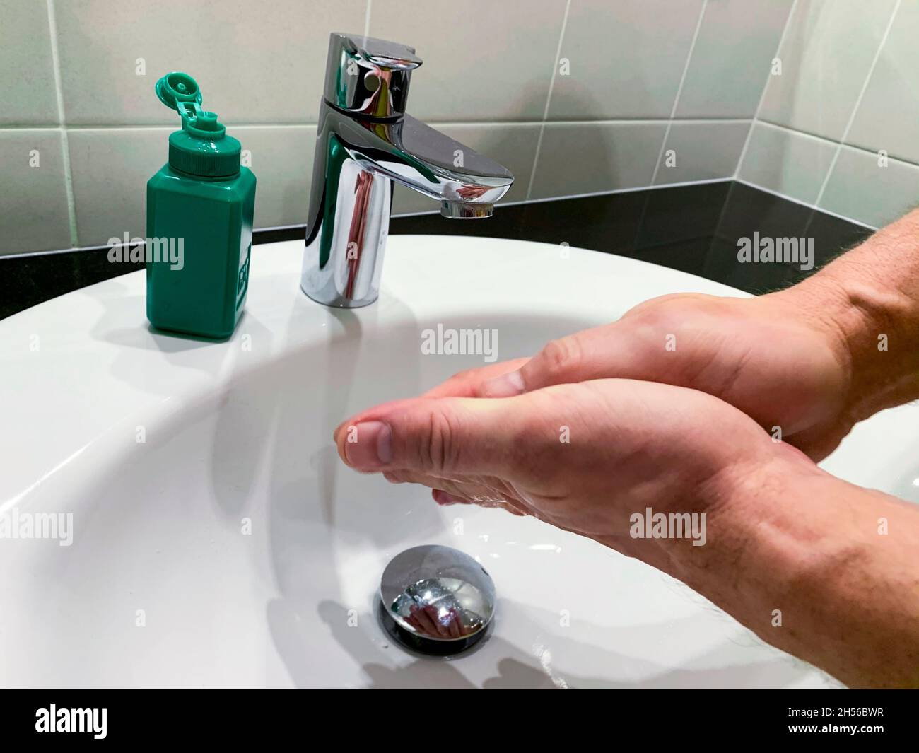 Hand treatment with antiseptic for disease prevention. Studio Photo ...