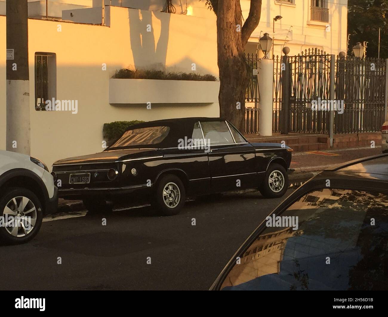 BMW Series 3 (E21): Rear view of the car parked on the street, black ...