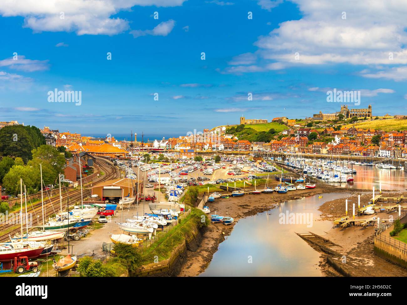 Sunshine on Whitby town, harbour and abbey Stock Photo - Alamy