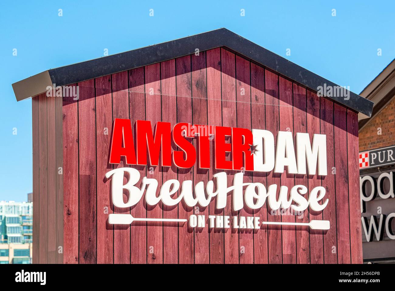 Entrance sign of the Amsterdam Brewhouse restaurant in the waterfront ...