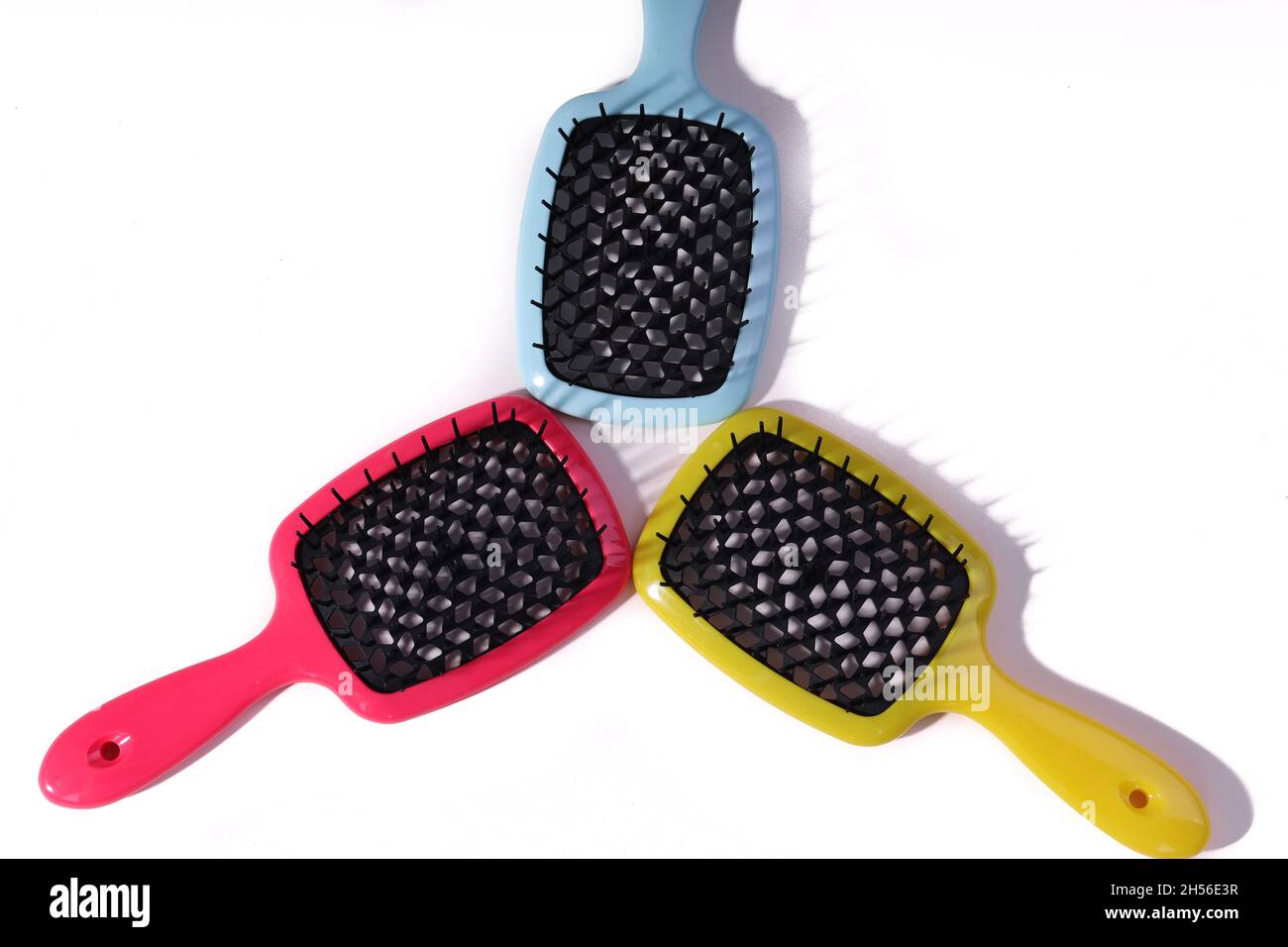 Multi-colored hair combs on an isolated white background Stock Photo ...