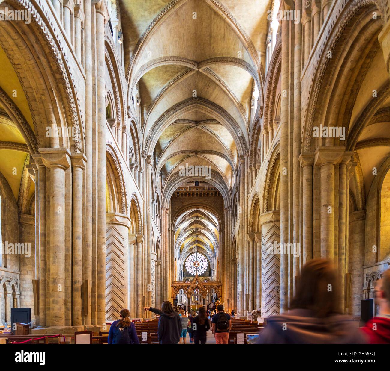 Sun shines through the stained glass windows of Durham cathedral Stock ...