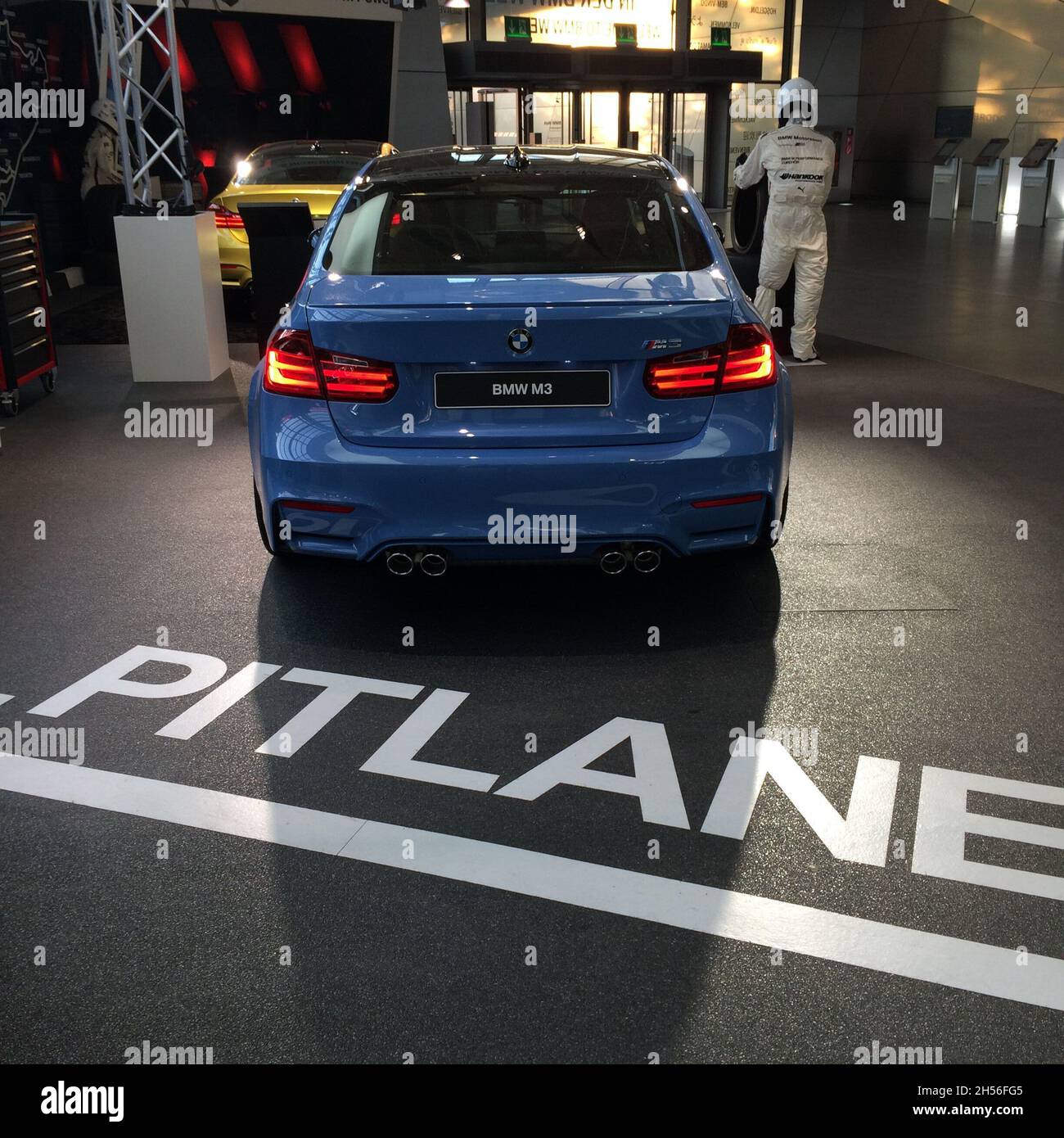 BMW M3 (F80), fifth generation, seen from the trunk, blue color ...