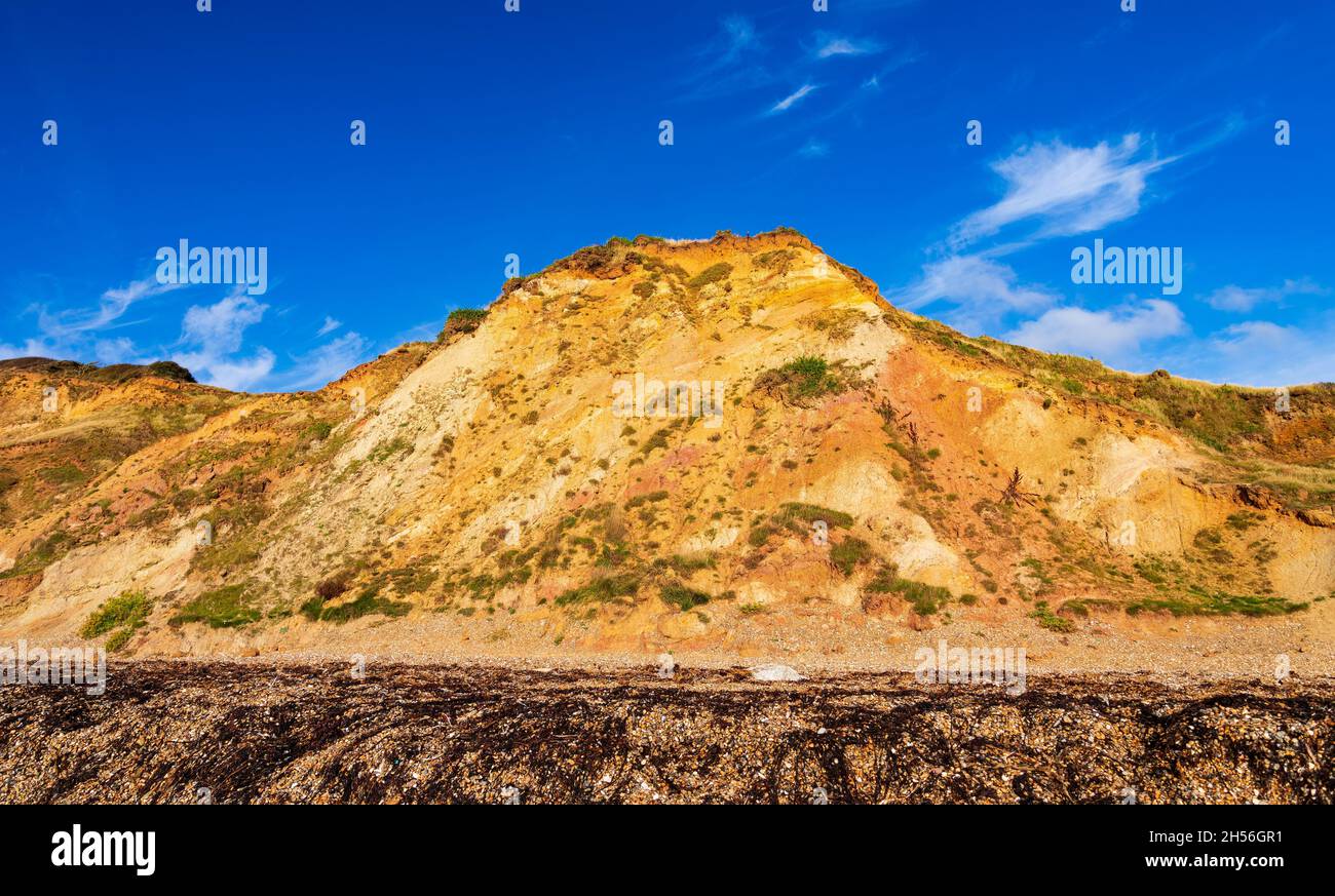Multi-coloured sands on the beach and cliffs at Worbarrow Bay near the ...