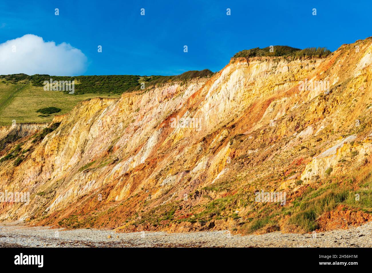 Multi-coloured sands on the beach and cliffs at Worbarrow Bay near the ...