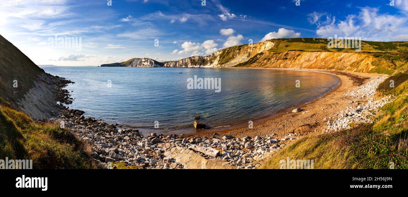 Multi-coloured sands on the beach and cliffs at Worbarrow Bay near the ...