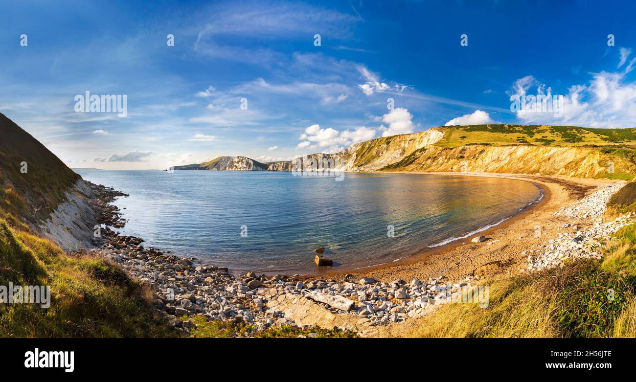 Multi-coloured sands on the beach and cliffs at Worbarrow Bay near the ...