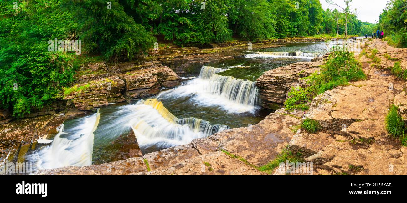 Rapid water flows through the Aysgarth Falls in the Yorkshire Dales ...
