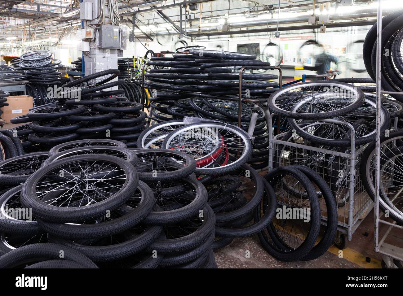 motorcycle and moped assembly plant, new wheels and tires before ...
