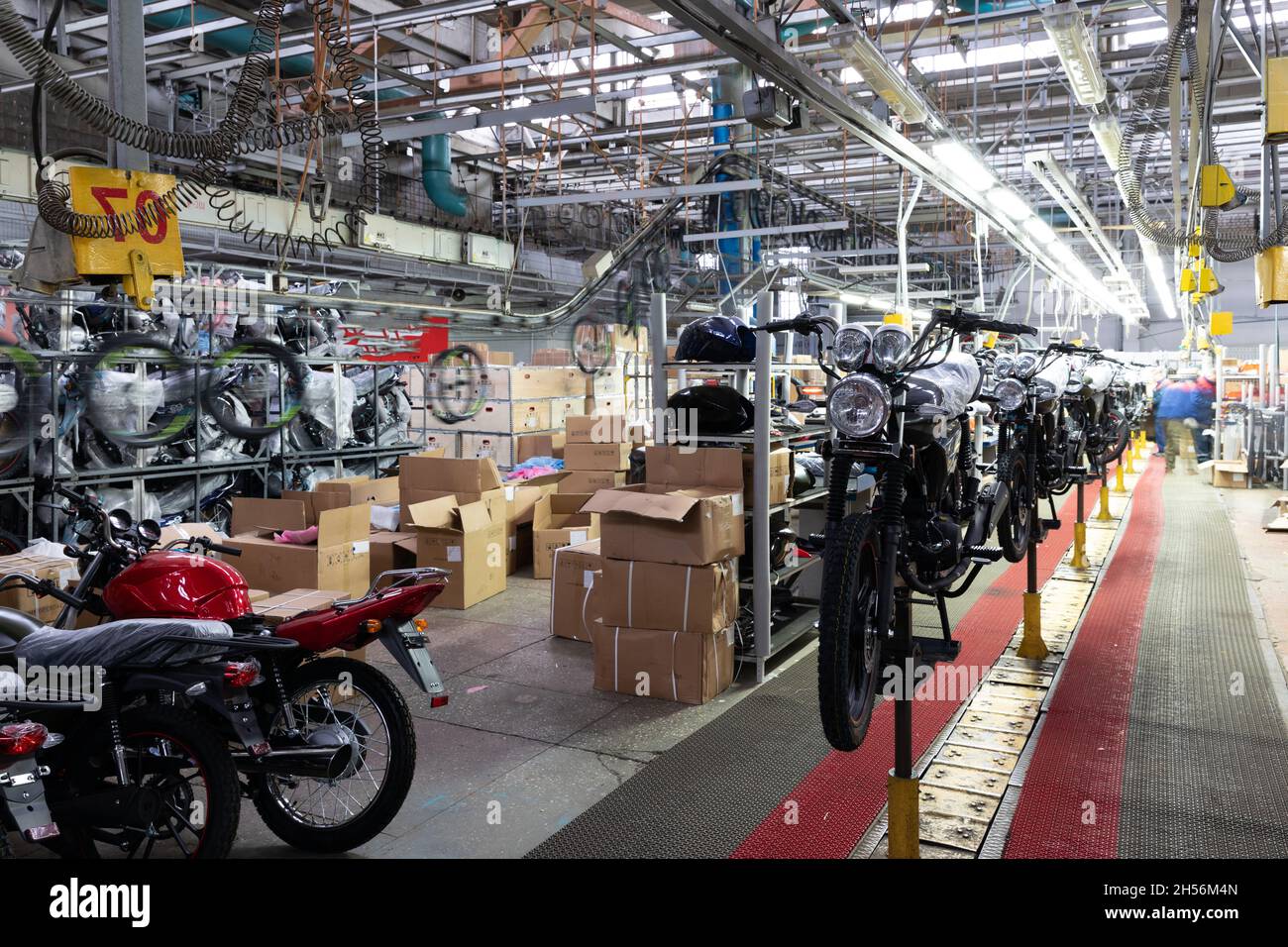 assembly line in a motorcycle factory, manual labor Stock Photo - Alamy