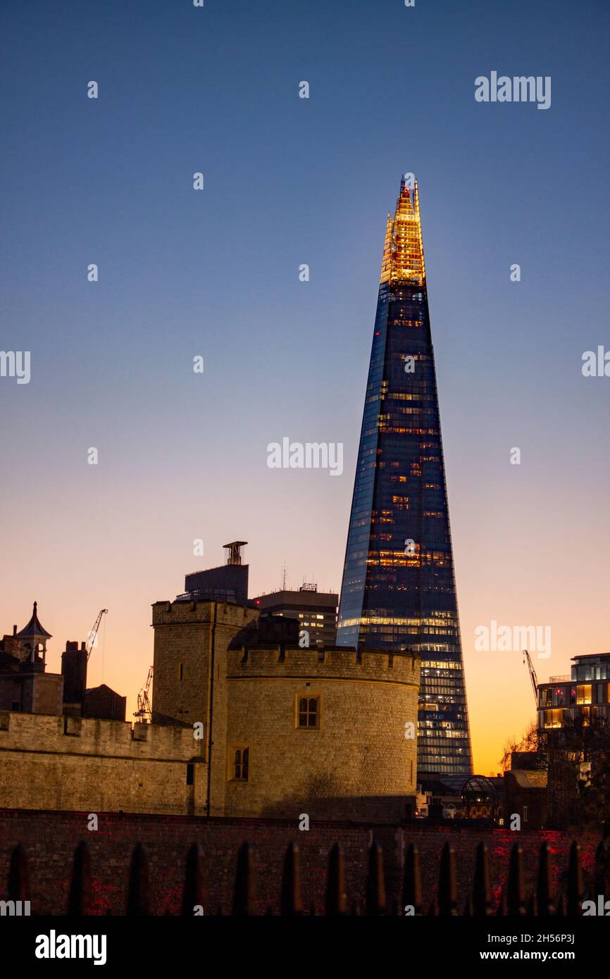 UK, London - The Shard and Tower of London at sunset Stock Photo - Alamy