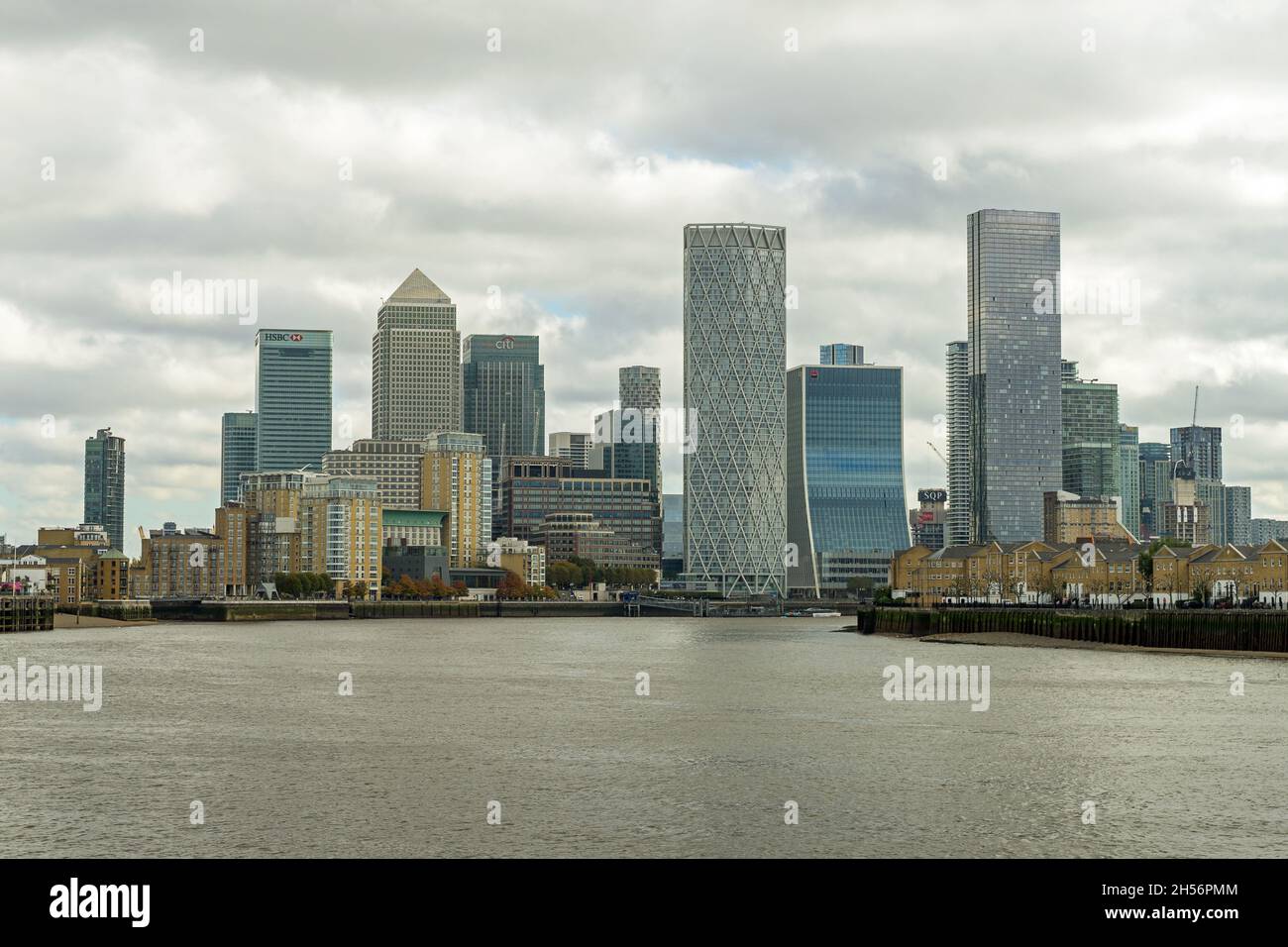The skyline of Canary Wharf in London's Docklands on a cloudy overcast ...
