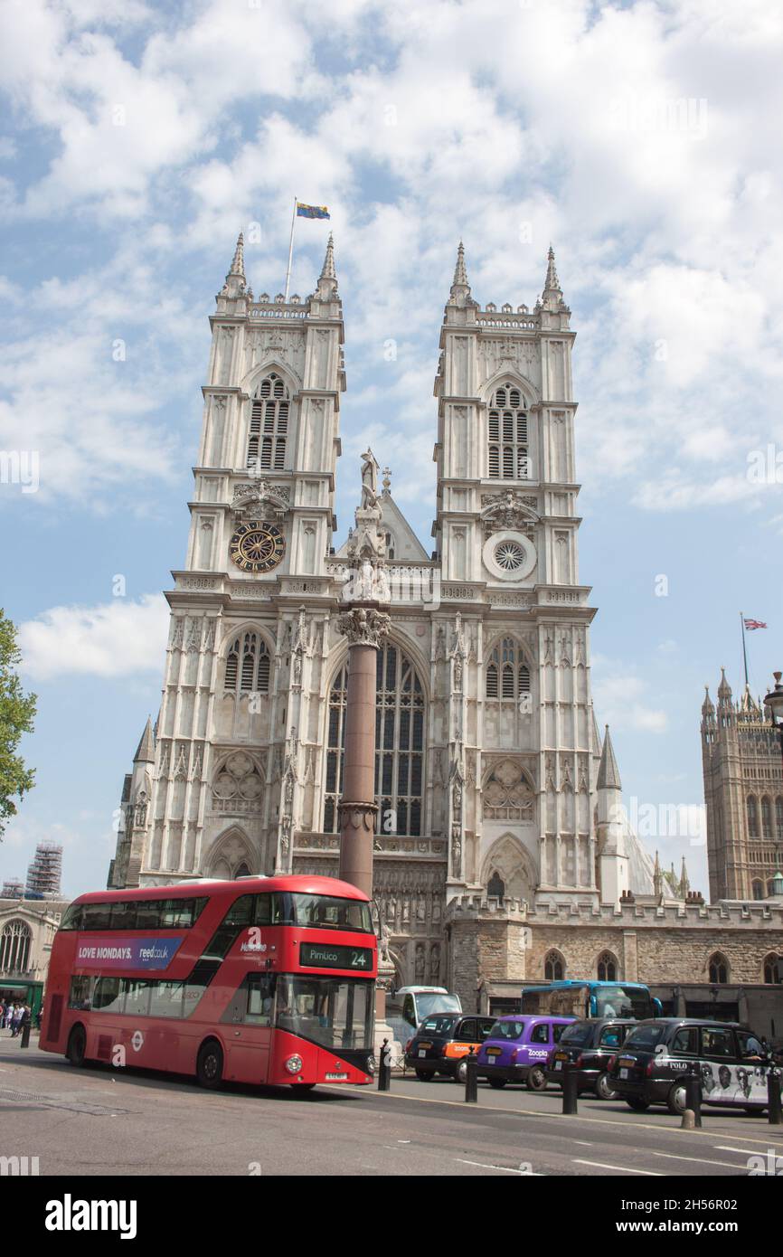 New Routemaster (Boris bus) passing Westminster Abbey Stock Photo - Alamy