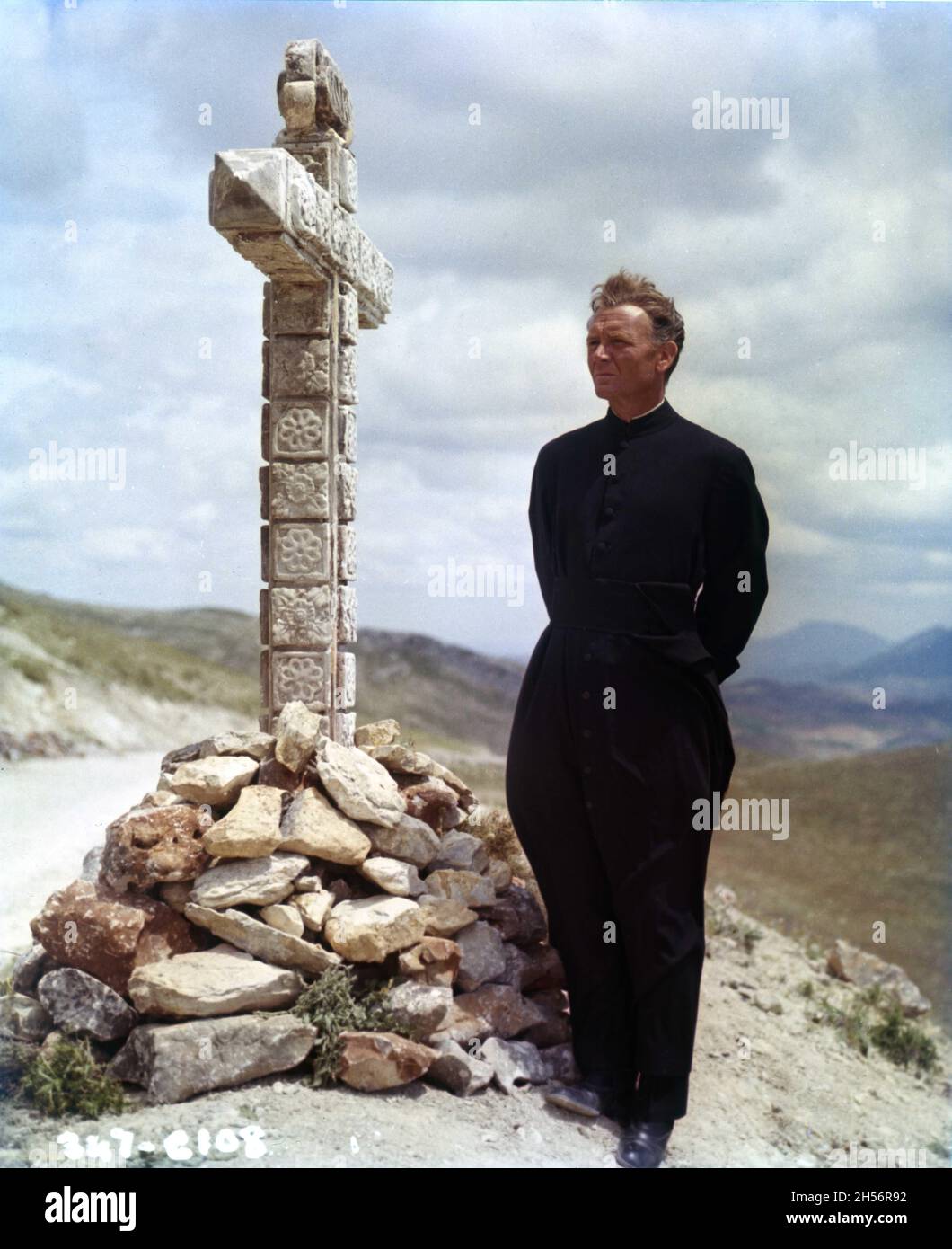 JOHN MILLS as Father Keogh in THE SINGER NOT THE SONG 1961 director ...