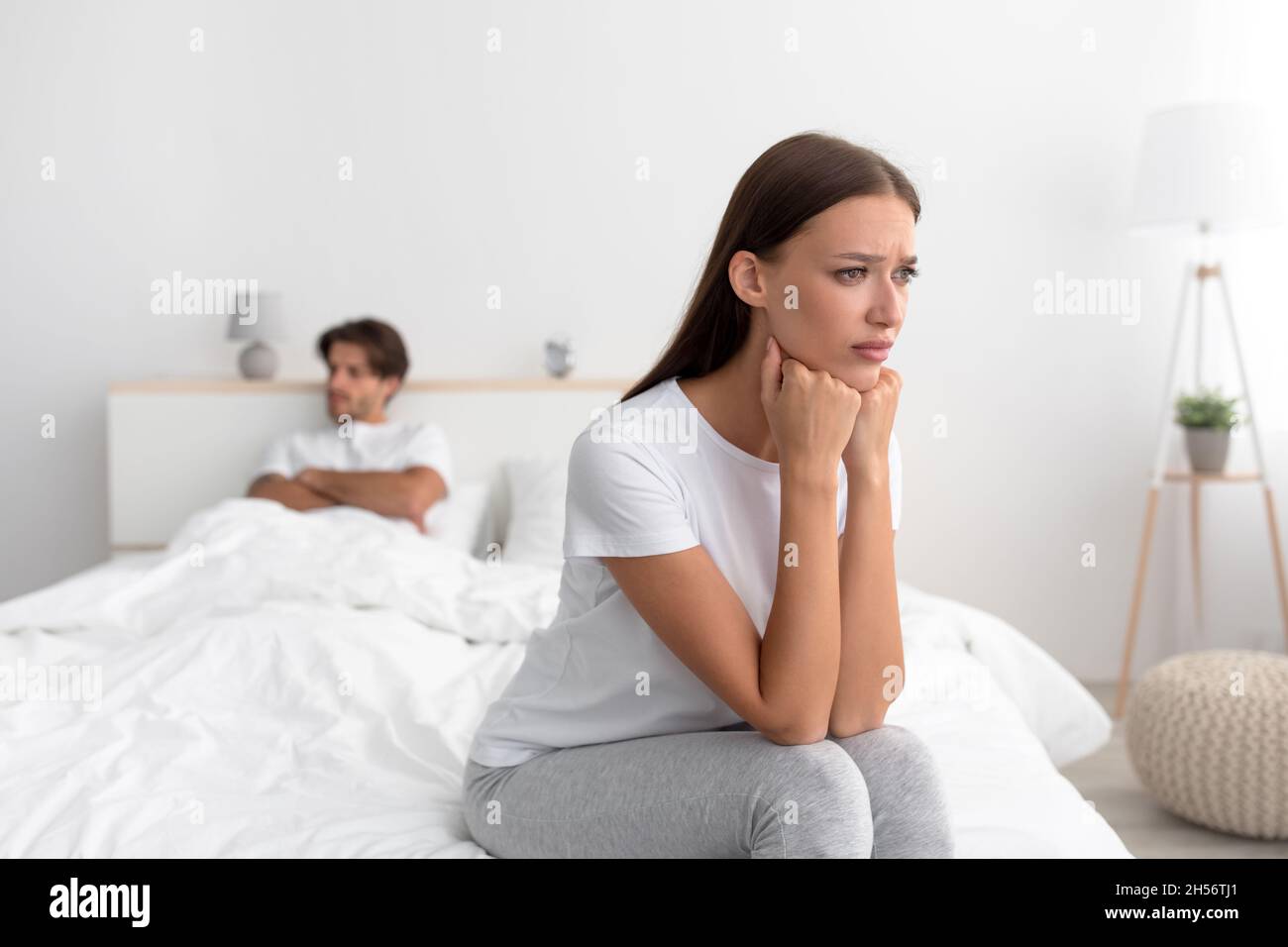 Upset unhappy offended angry millennial european wife sitting on bed ...