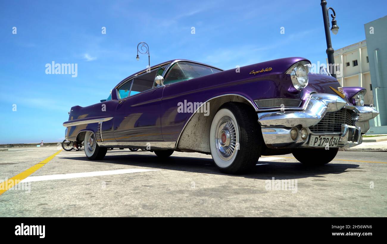 Retro Cadillac on background of sky. Actio. Luxurious retro Cadillac in ...