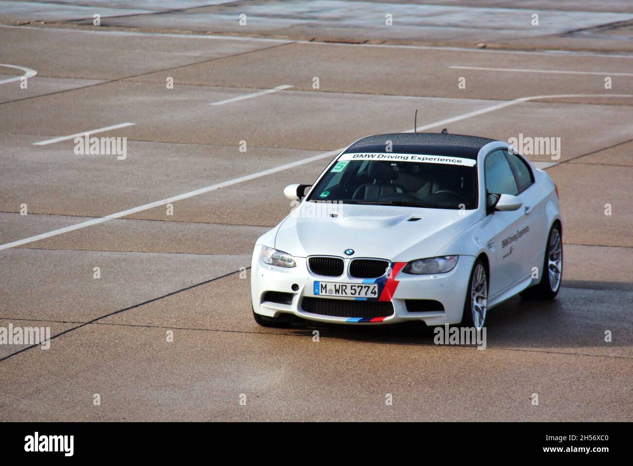 BMW M3: white with stickers, isolated, Munich, Germany. Training for ...