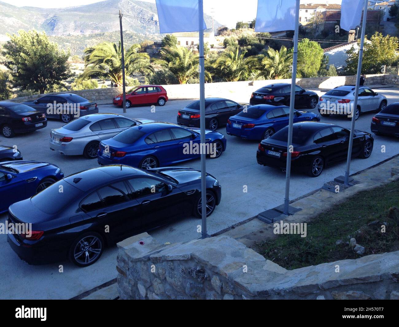The new BMW M5 (F10): Rear view of parked cars. Manufactured from 2011 ...