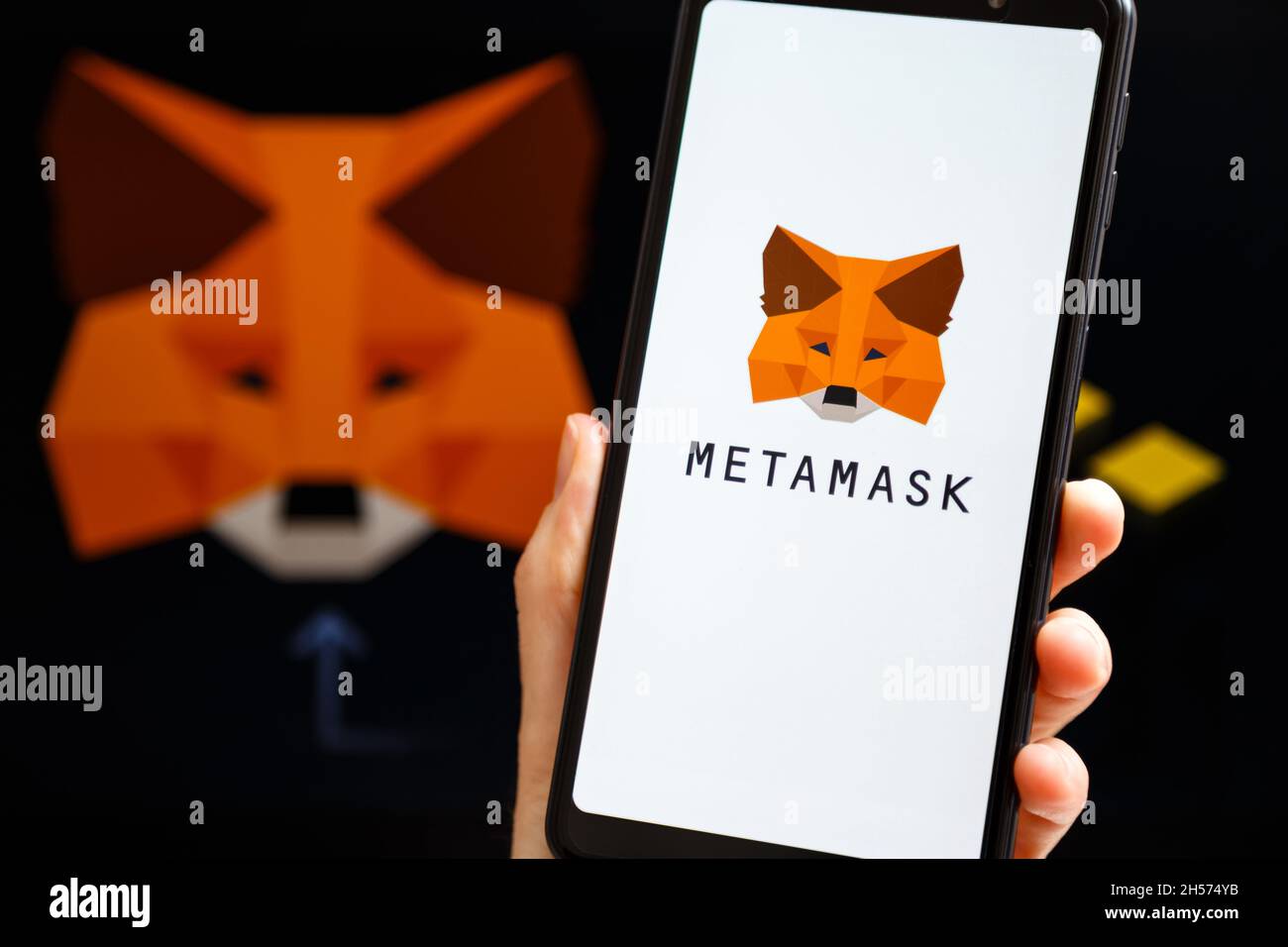Ukraine, Odessa - October, 9 2021: Hand holding mobile with MetaMask ...