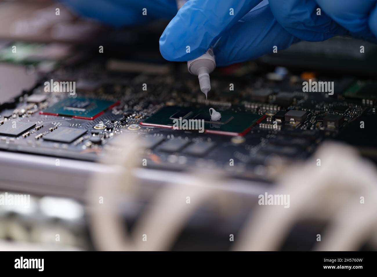 Thermal paste for processor, computer repair Stock Photo - Alamy