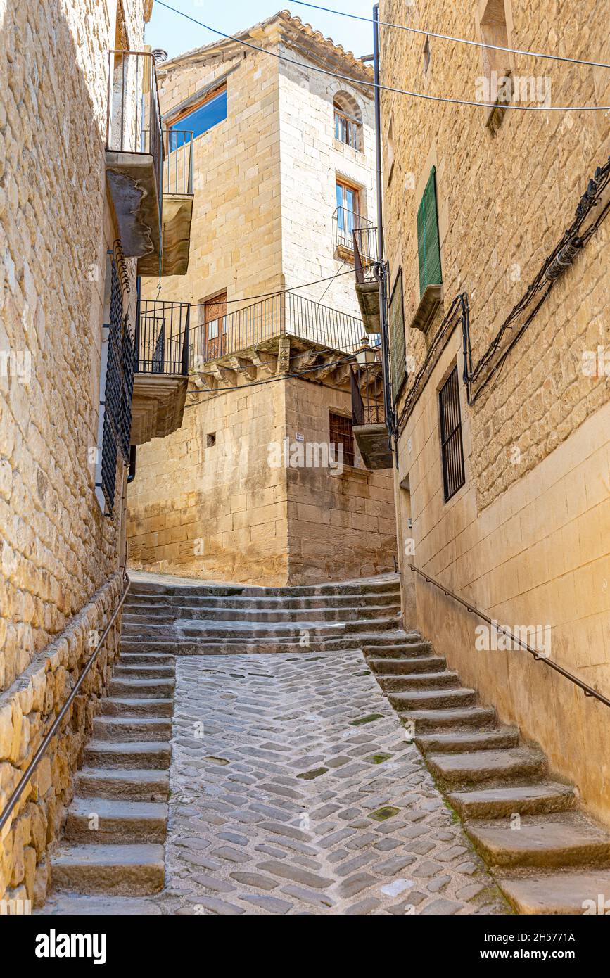 A vertical shot of an old historical stone village street in Calaceite ...