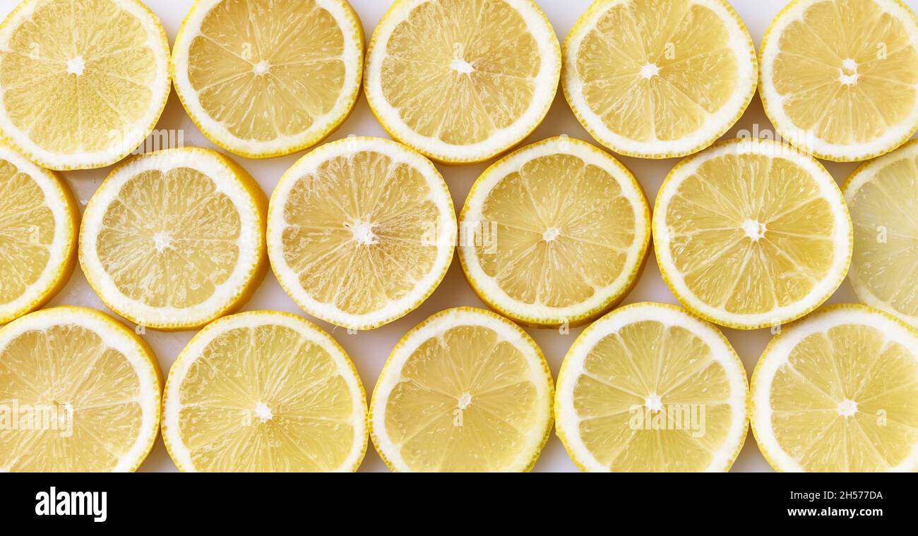 Slices of lemon texture Stock Photo - Alamy