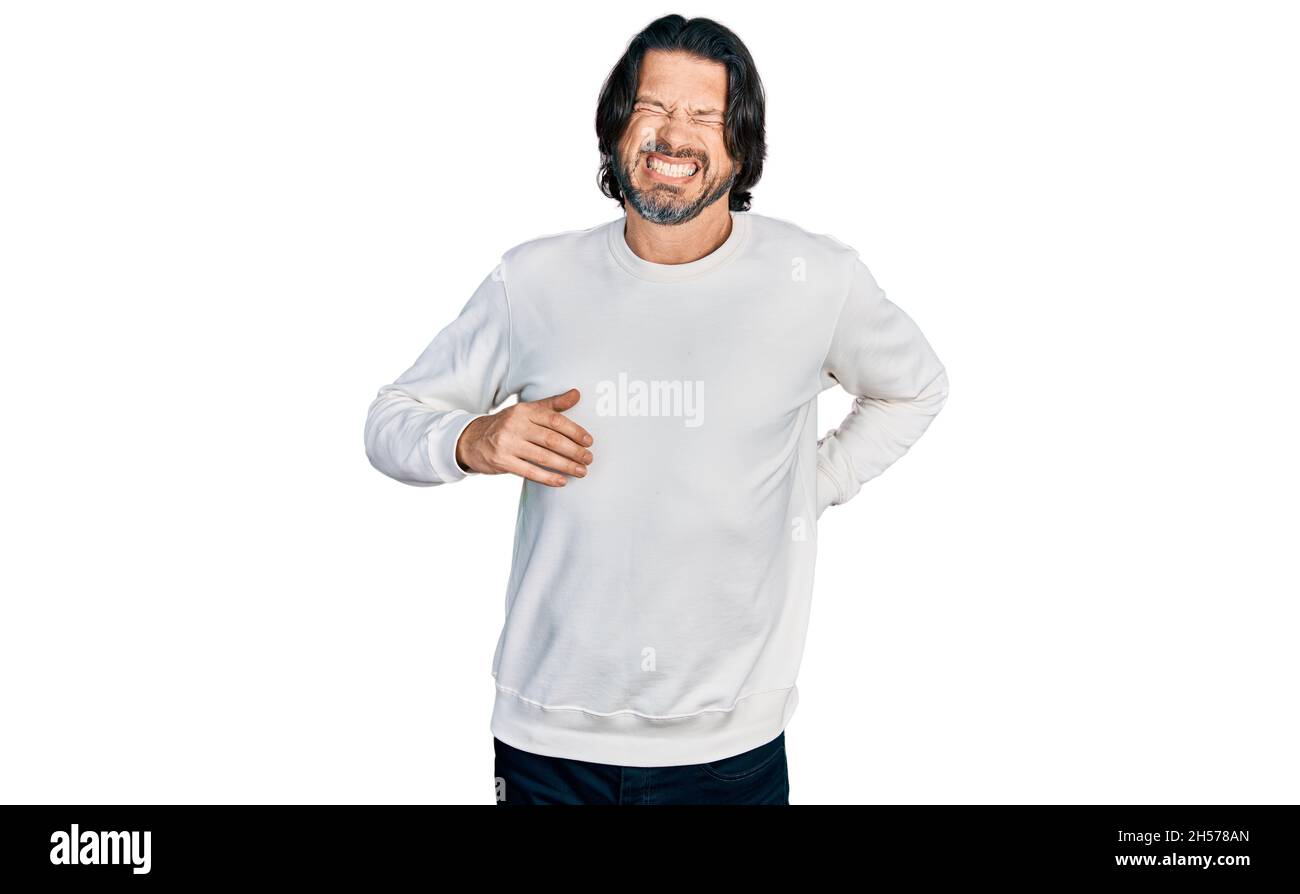 Middle age caucasian man wearing casual clothes suffering of neck ache ...