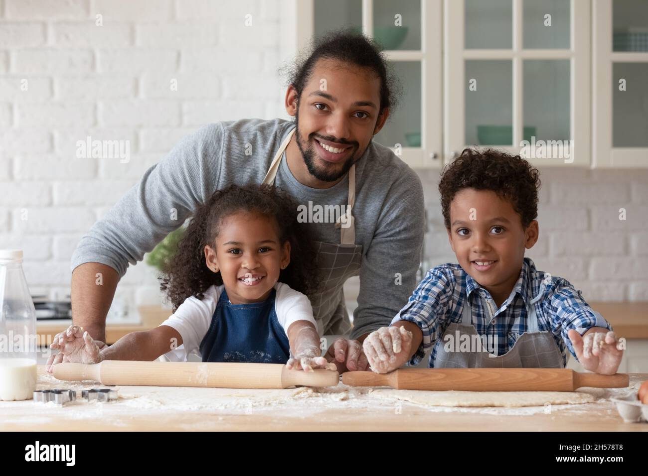 Black girl helping in kitchen hi-res stock photography and images - Alamy