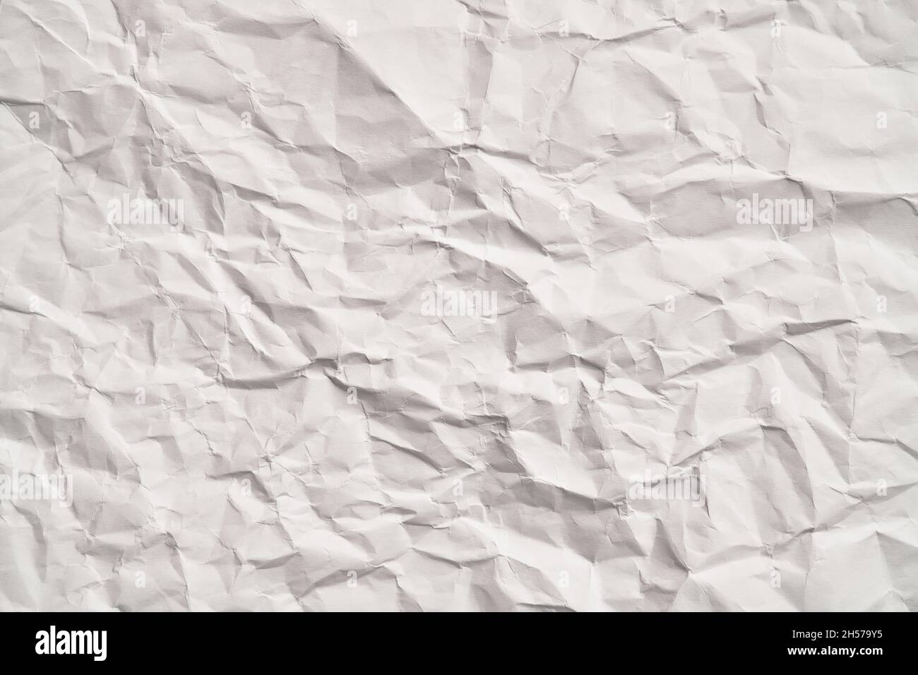 White crumpled paper texture with wrinkles. Damaged and torn sheet ...