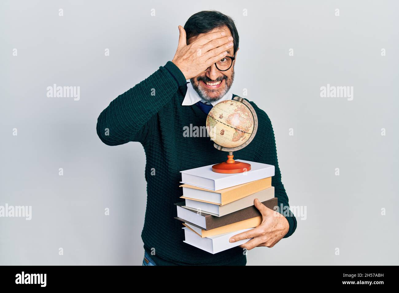 Middle age hispanic man graduated on geography stressed and frustrated ...