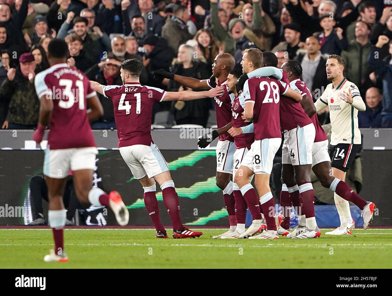 West Ham United players celebrate their side's first goal of the game ...
