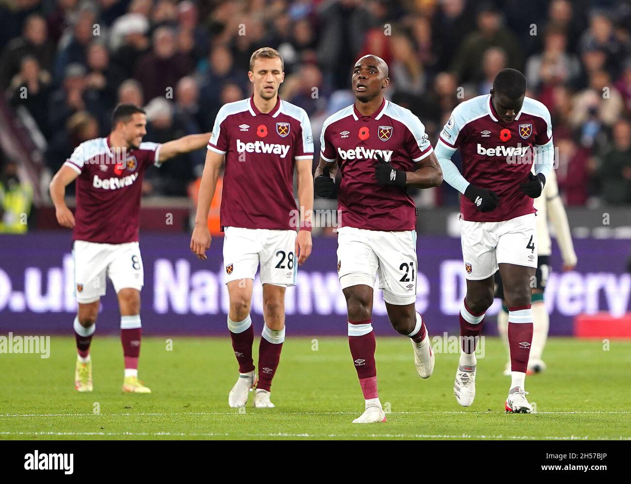 West Ham United players celebrate their side's first goal of the game ...