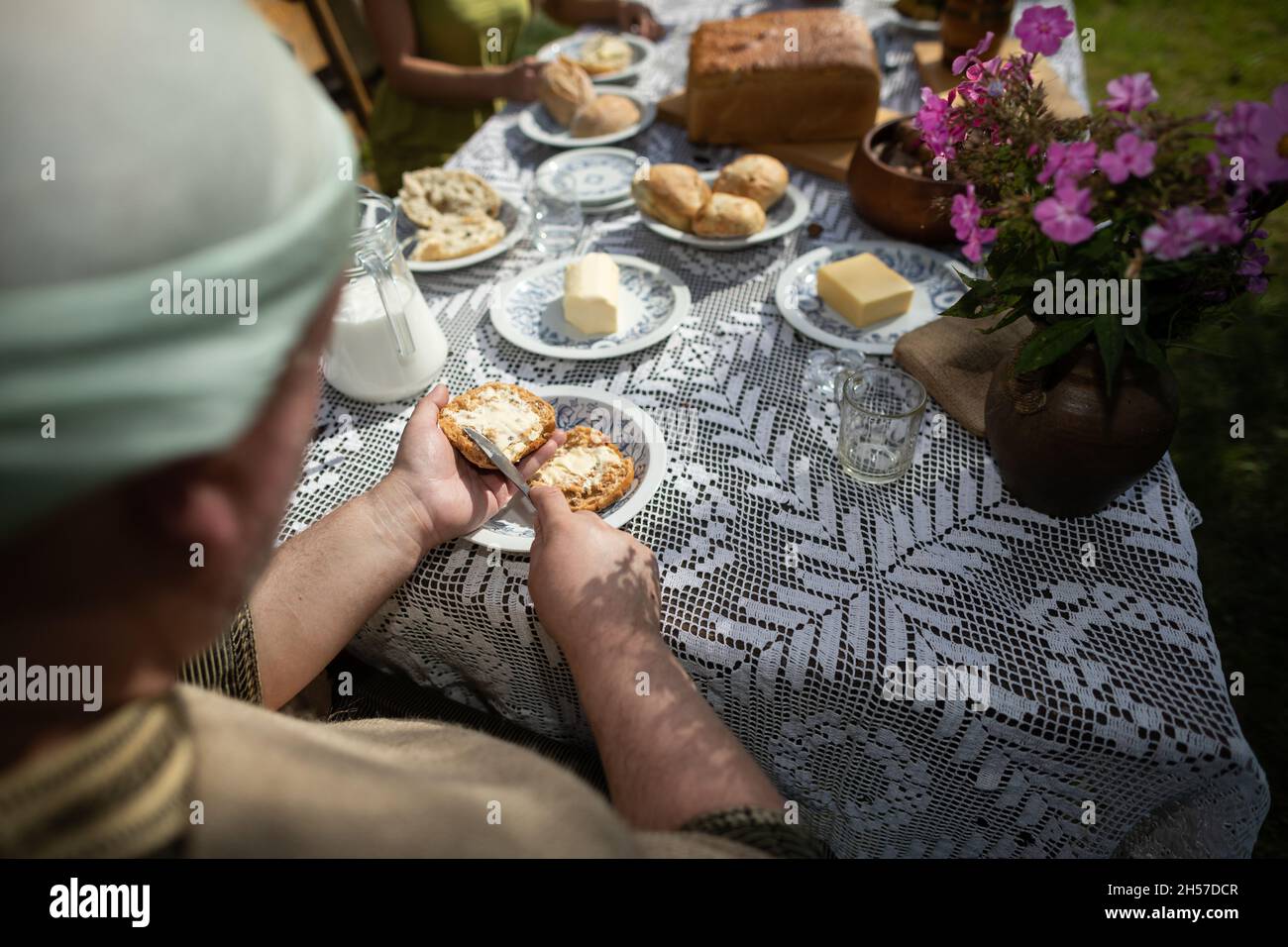 Male hands spreading butter on hi-res stock photography and images - Alamy