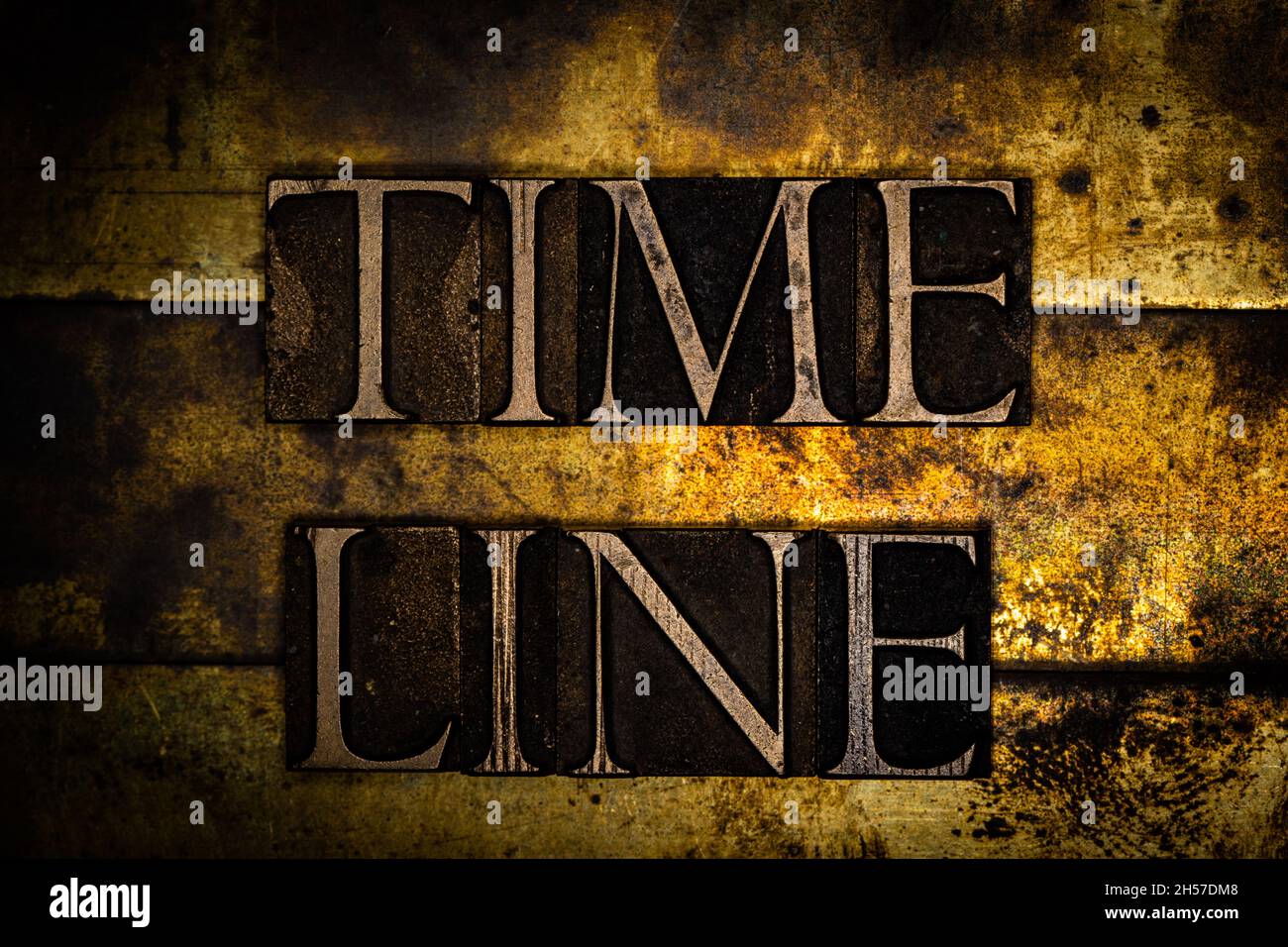 Time Line text on textured grunge copper and vintage gold background ...