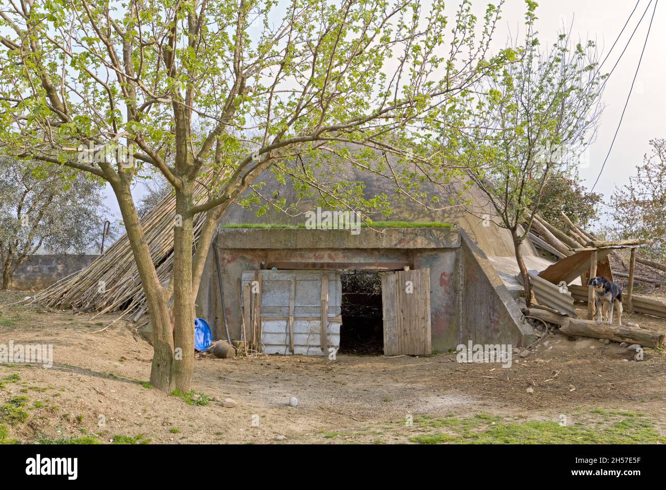 A bunker built by the communist regime of Albania that is today used as ...