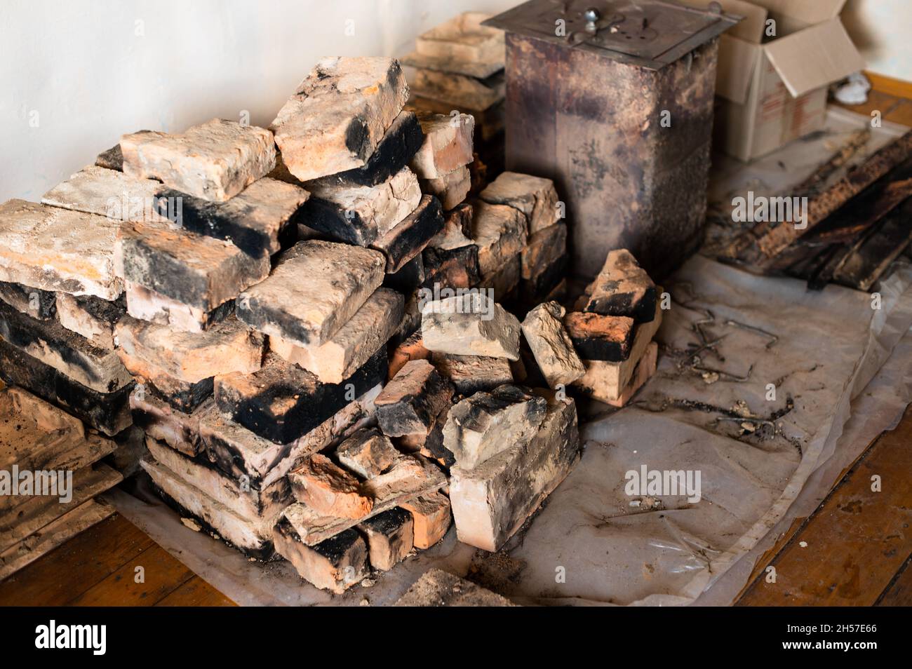 Dismantling an old oven with a built-in kitchen surface for cooking ...