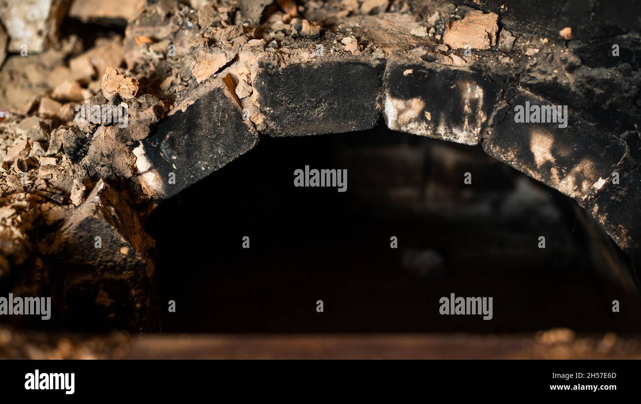 Dismantling an old oven with a built-in kitchen surface for cooking ...