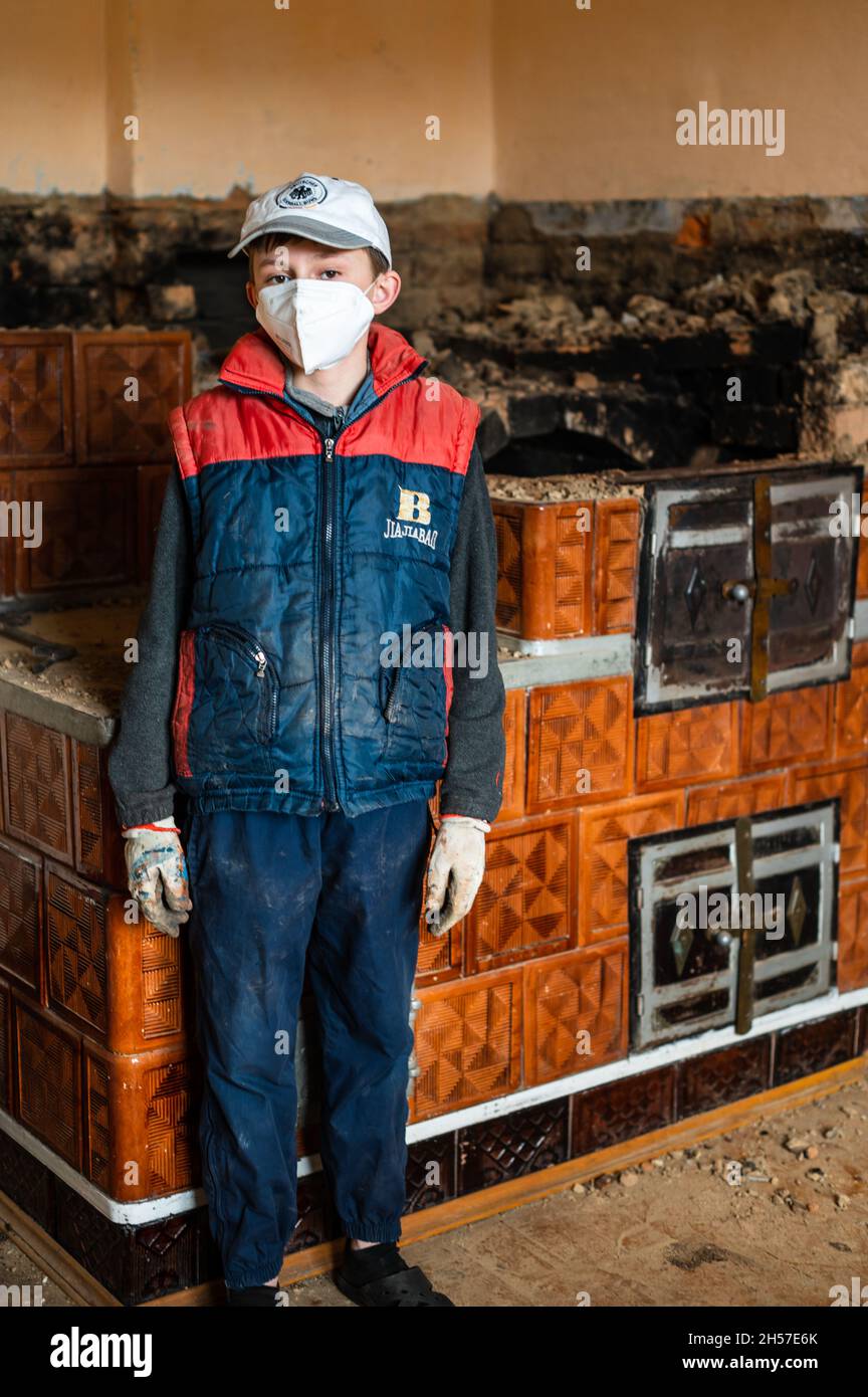 Dismantling an old oven with a built-in kitchen surface for cooking ...