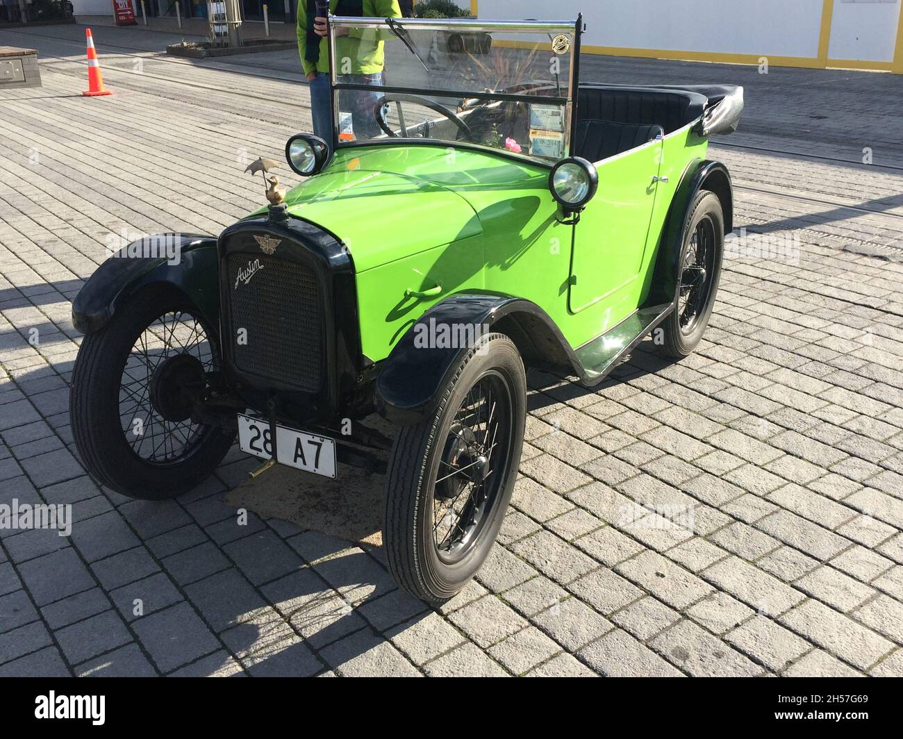 Vintage car: Austin 7 or Baby Austin, light green, convertible, parked ...