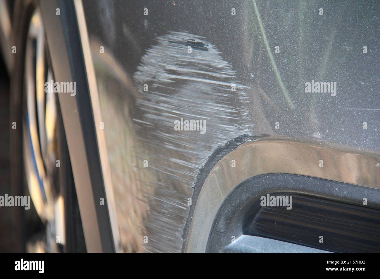 Accident with car damage, scratches on the front bumper of a gray car ...