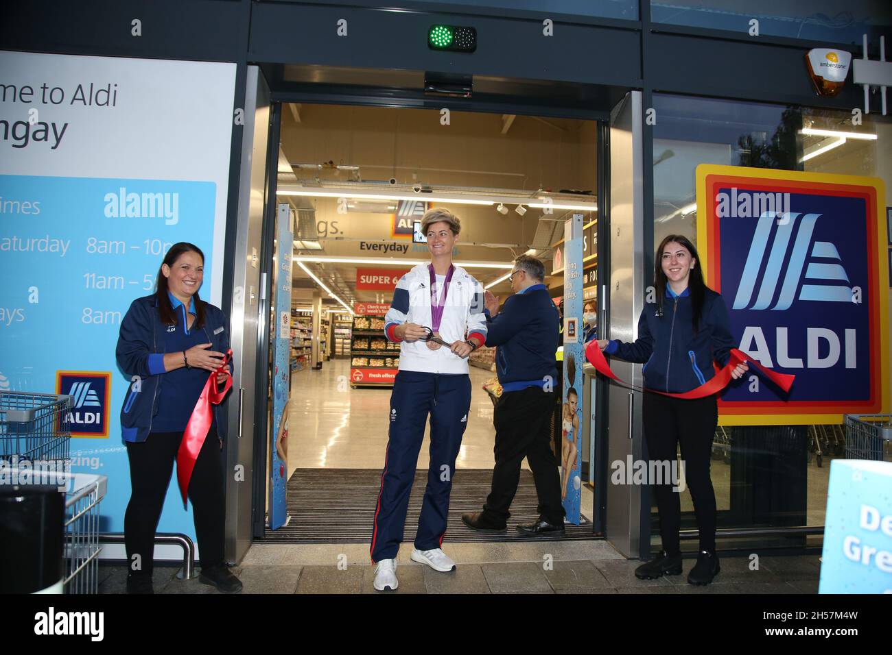 British hockey bronze medalist Sally Walton cuts the ribbon and opens a ...