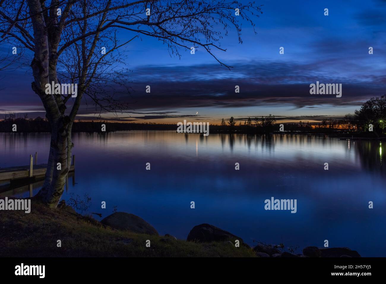 Crescent moon over the Chippewa Flowage in northern Wisconsin Stock ...