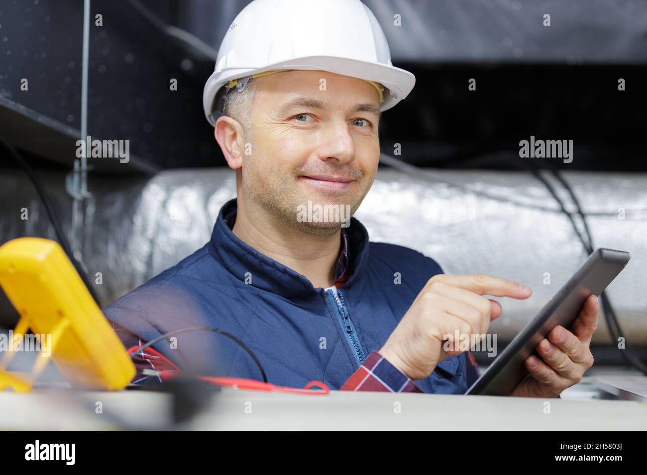 building renovation technology electricity and people concept Stock ...